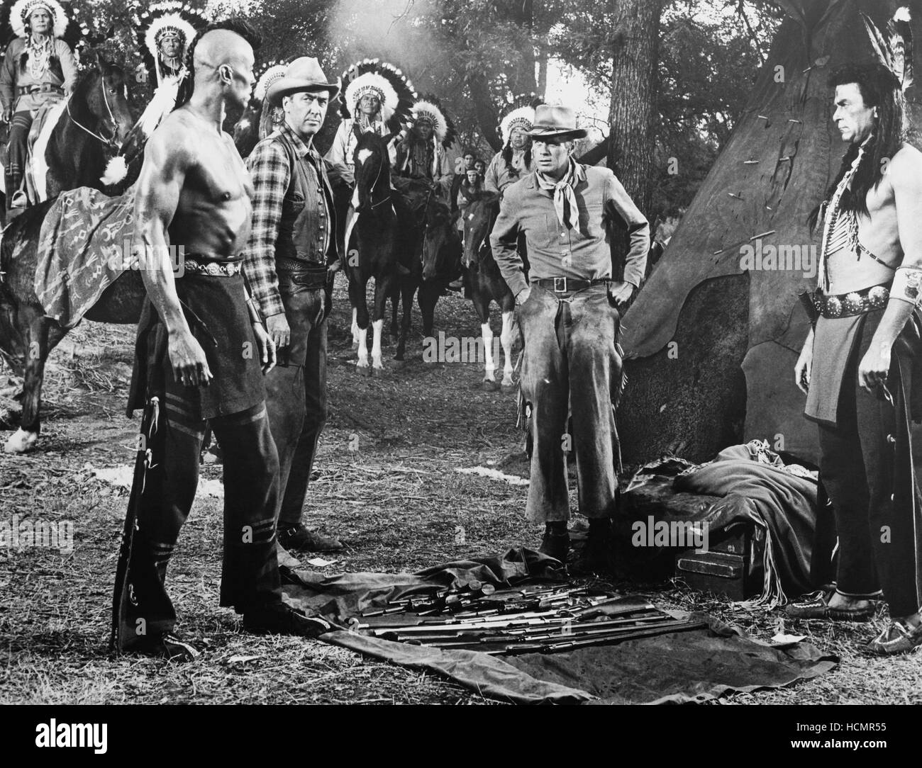TWO RODE TOGETHER, front from left: Woody Strode, James Stewart ...