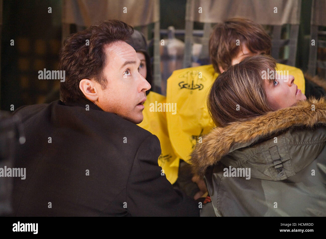 2012, from left: John Cusack, Amanda Peet, 2009. ©Sony Pictures ...