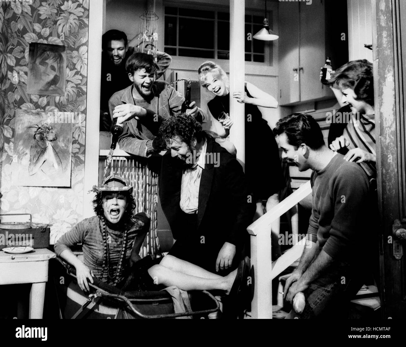 THE SUBTERRANEANS, Jim Hutton (beard), Leslie Caron (hand on post ...