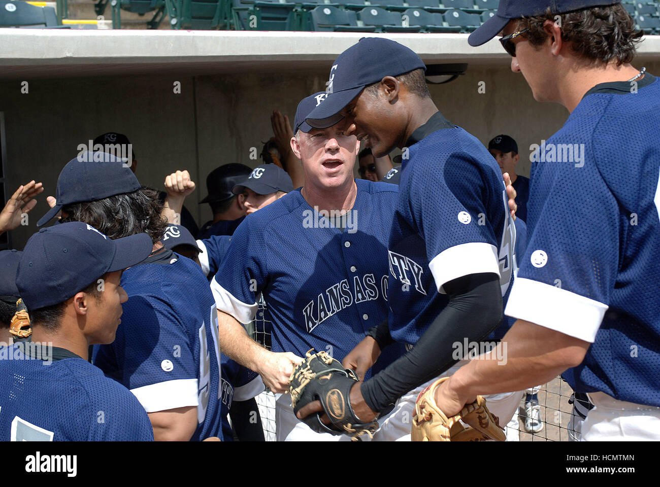 SUGAR, Algenis Perez Soto (center right, in profile, in long sleeves ...