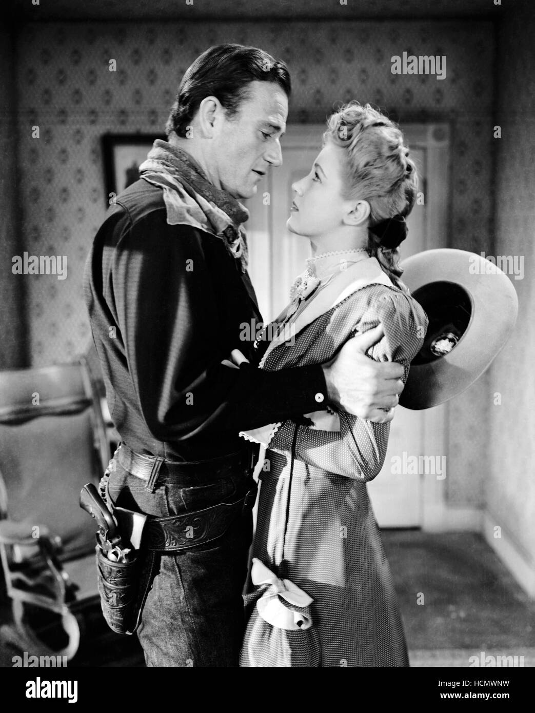 Tall in the saddle john wayne hi-res stock photography and images - Alamy