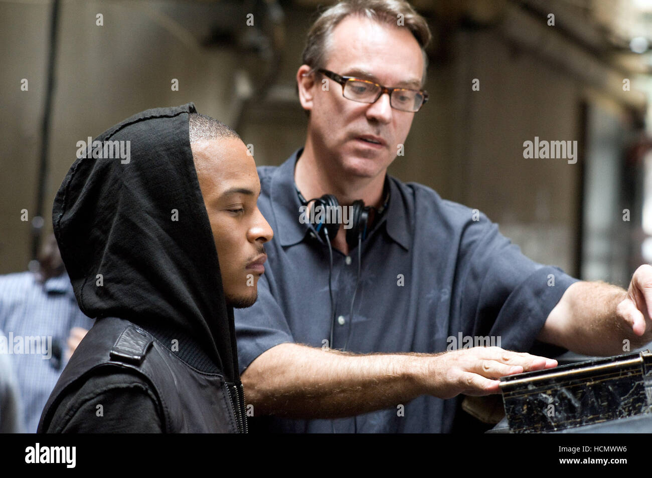 TAKERS, from left: T.I., director John Luessenhop, on set, 2010. ph ...