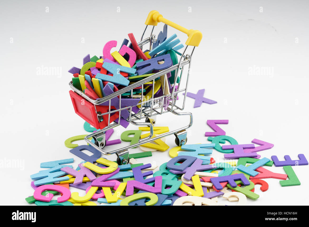 Toy trolley with wood alphabet letter Stock Photo - Alamy