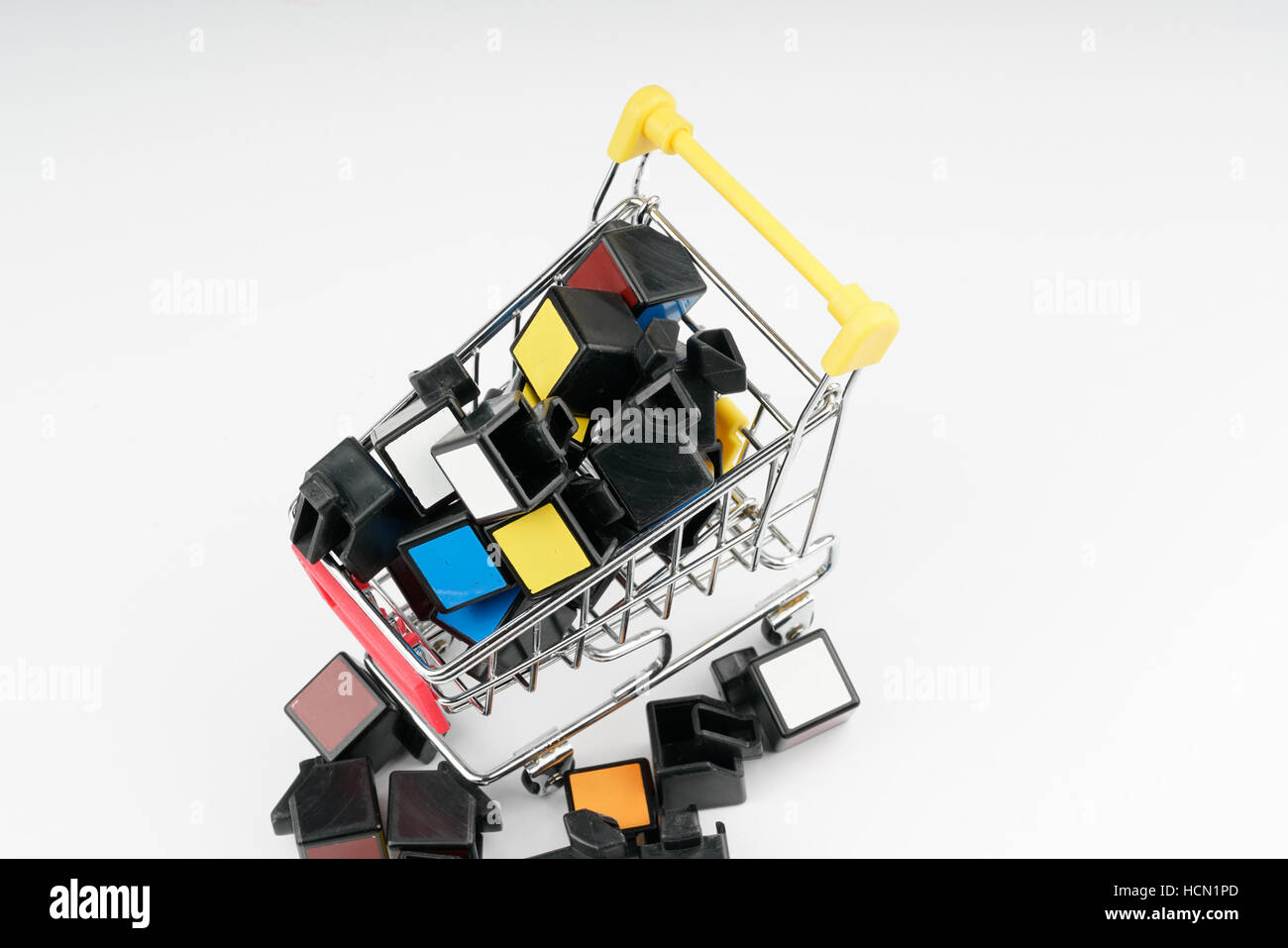 KUALA LUMPUR, MALAYSIA - OCTOBER 22, 2016: Toy trolley and broken rubic ...