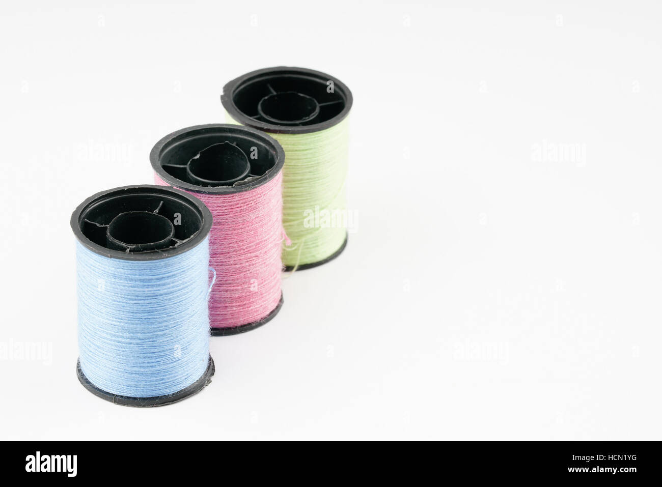 Spools of thread with close up view Stock Photo - Alamy