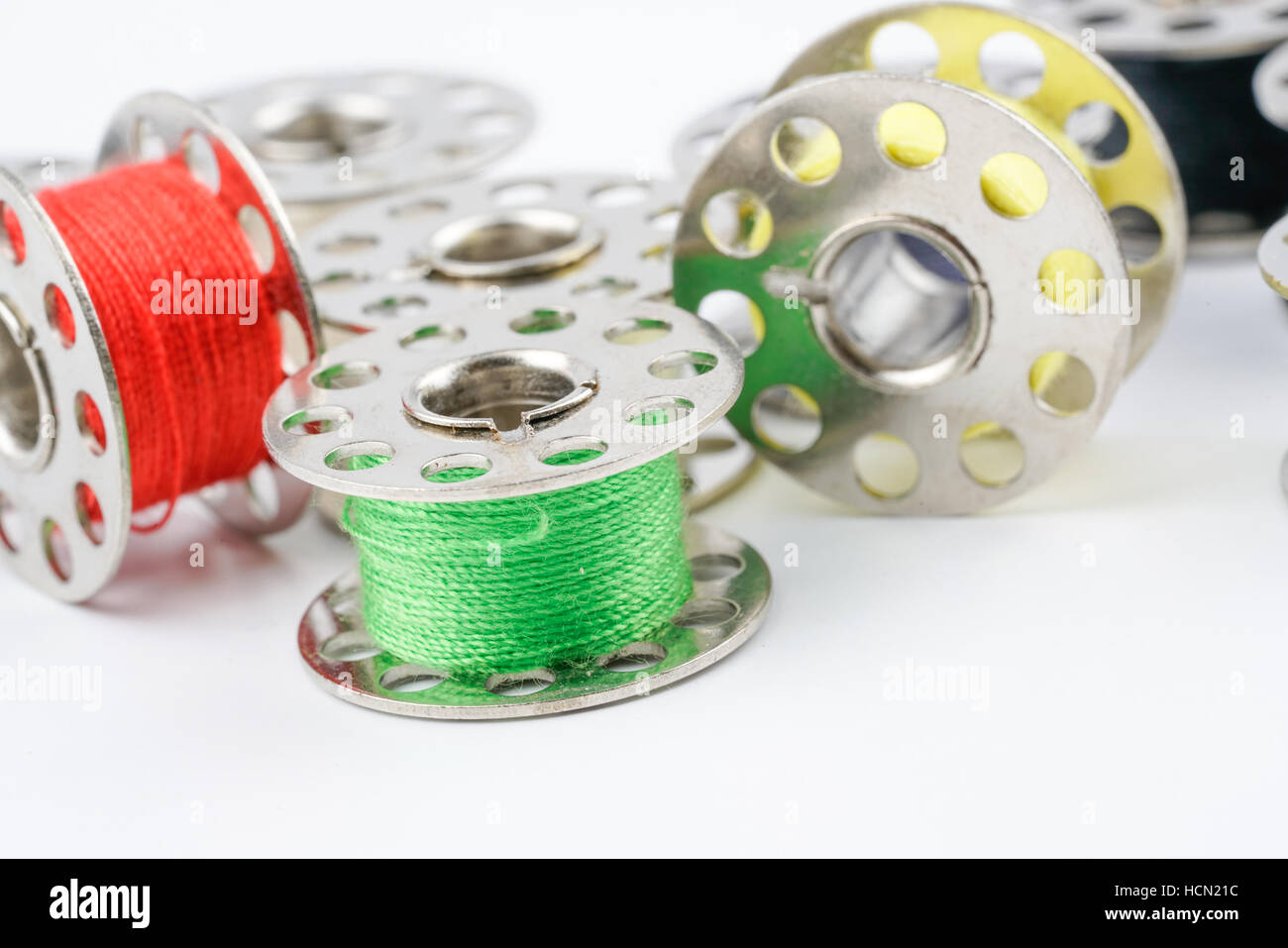 Spools of thread with close up view Stock Photo - Alamy