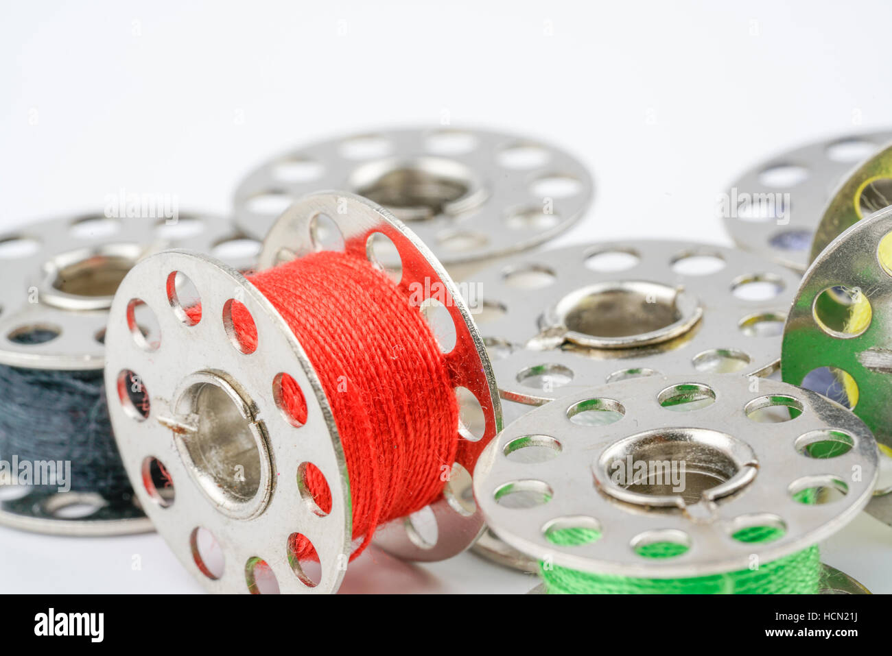 Spools of thread with close up view Stock Photo - Alamy