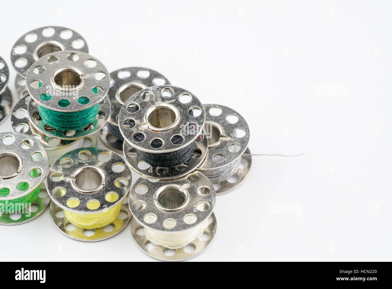 Spools of thread with close up view Stock Photo - Alamy