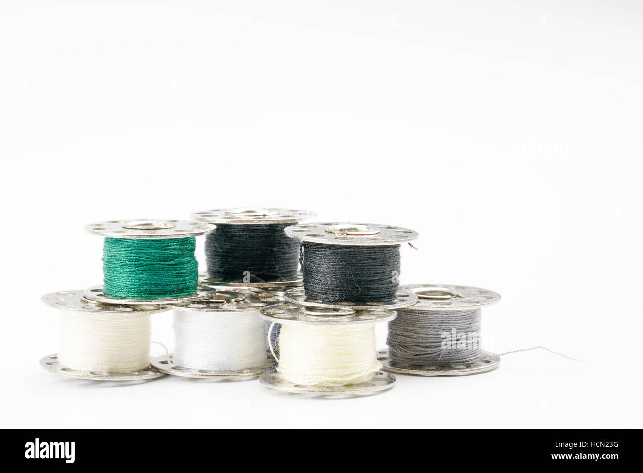 Spools of thread with close up view Stock Photo - Alamy