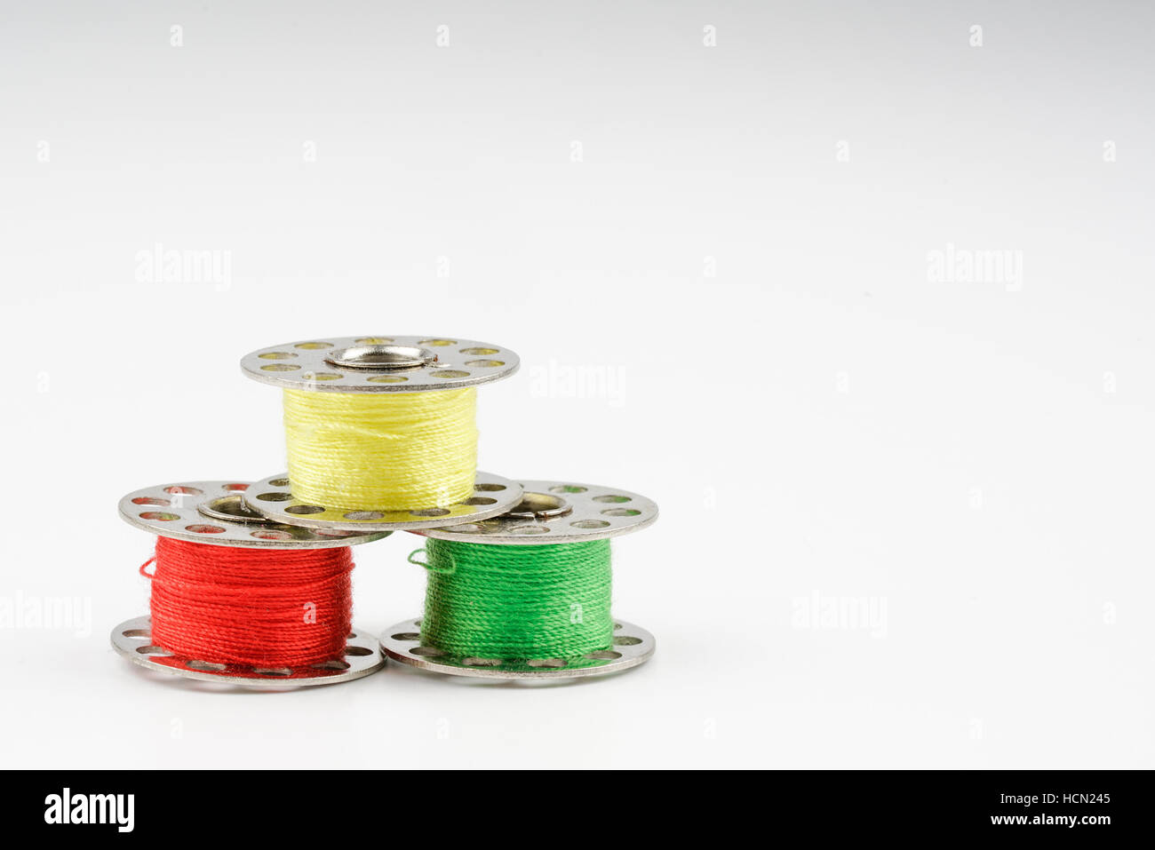 Spools of thread with close up view Stock Photo - Alamy