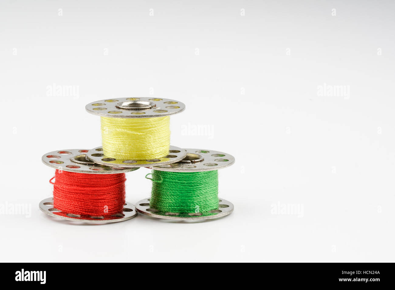 Spools of thread with close up view Stock Photo - Alamy