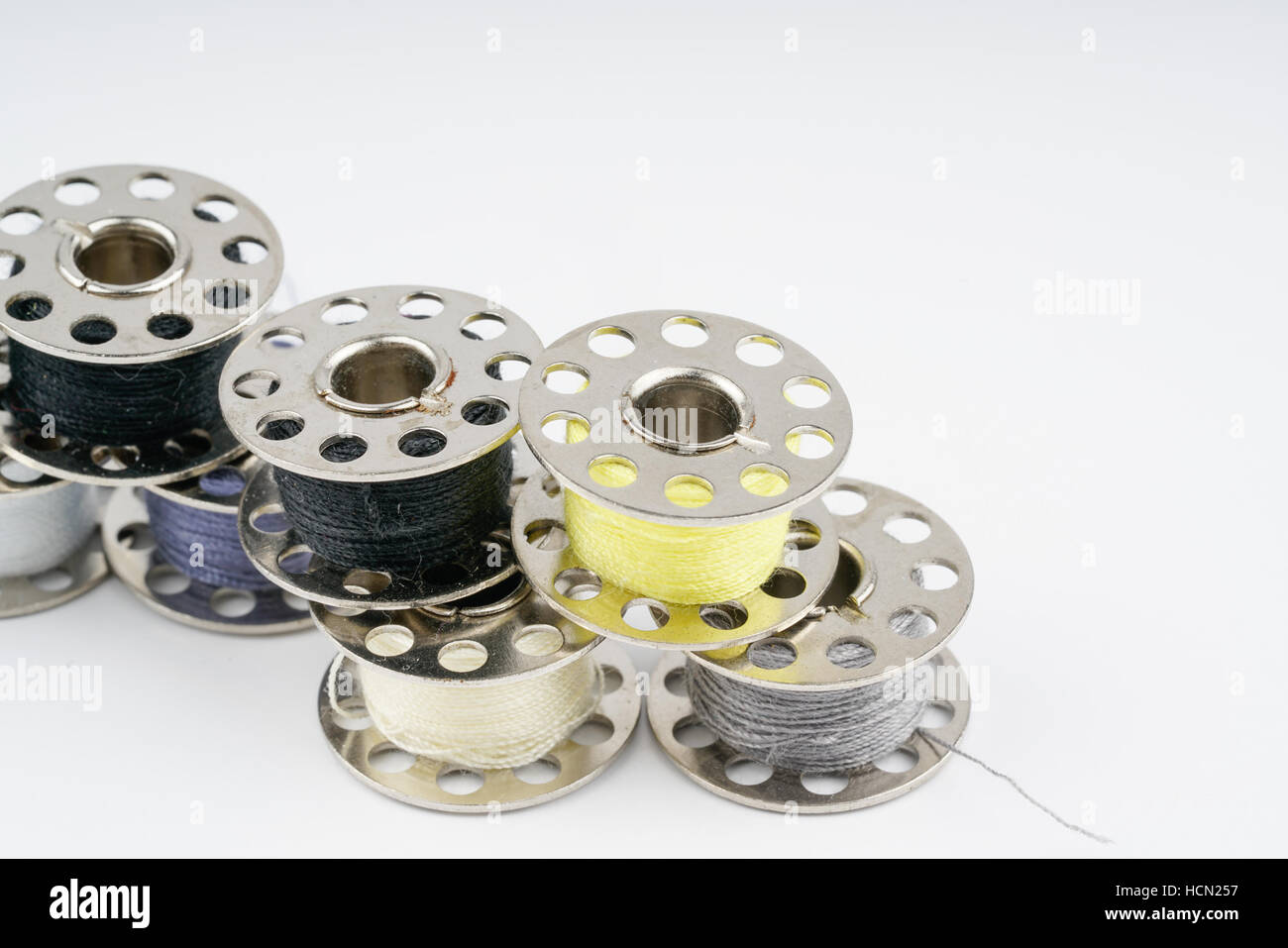 Spools of thread with close up view Stock Photo - Alamy