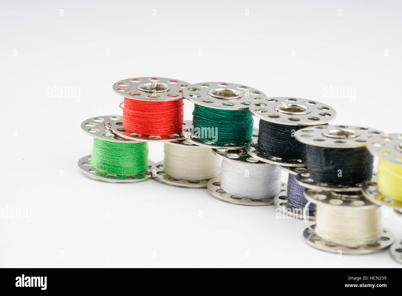 Spools of thread with close up view Stock Photo - Alamy