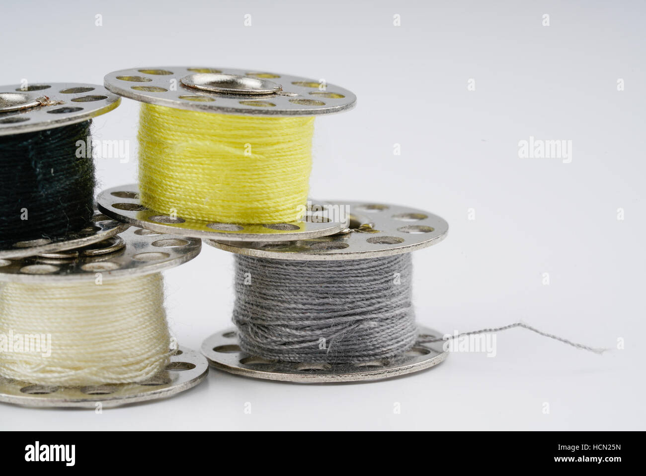 Spools of thread with close up view Stock Photo - Alamy