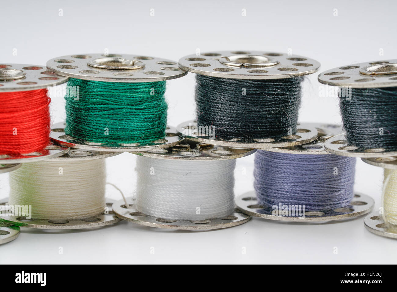 Spools of thread with close up view Stock Photo - Alamy