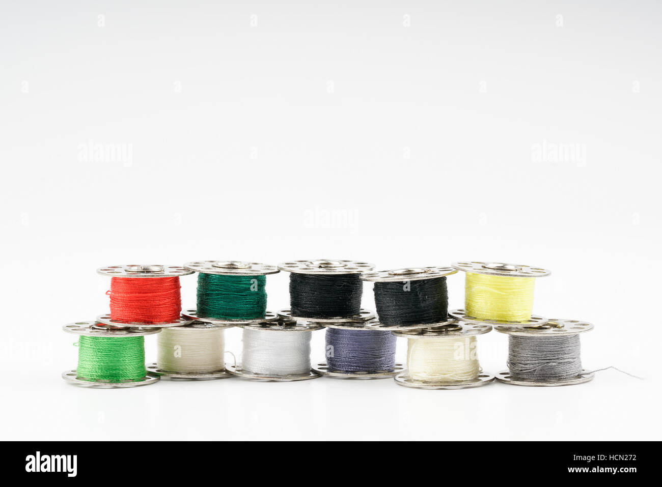 Spools of thread with close up view Stock Photo - Alamy