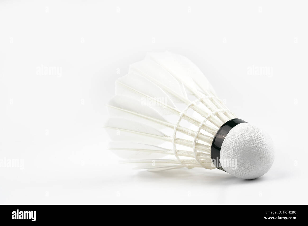 Shuttlecock with white background Stock Photo - Alamy