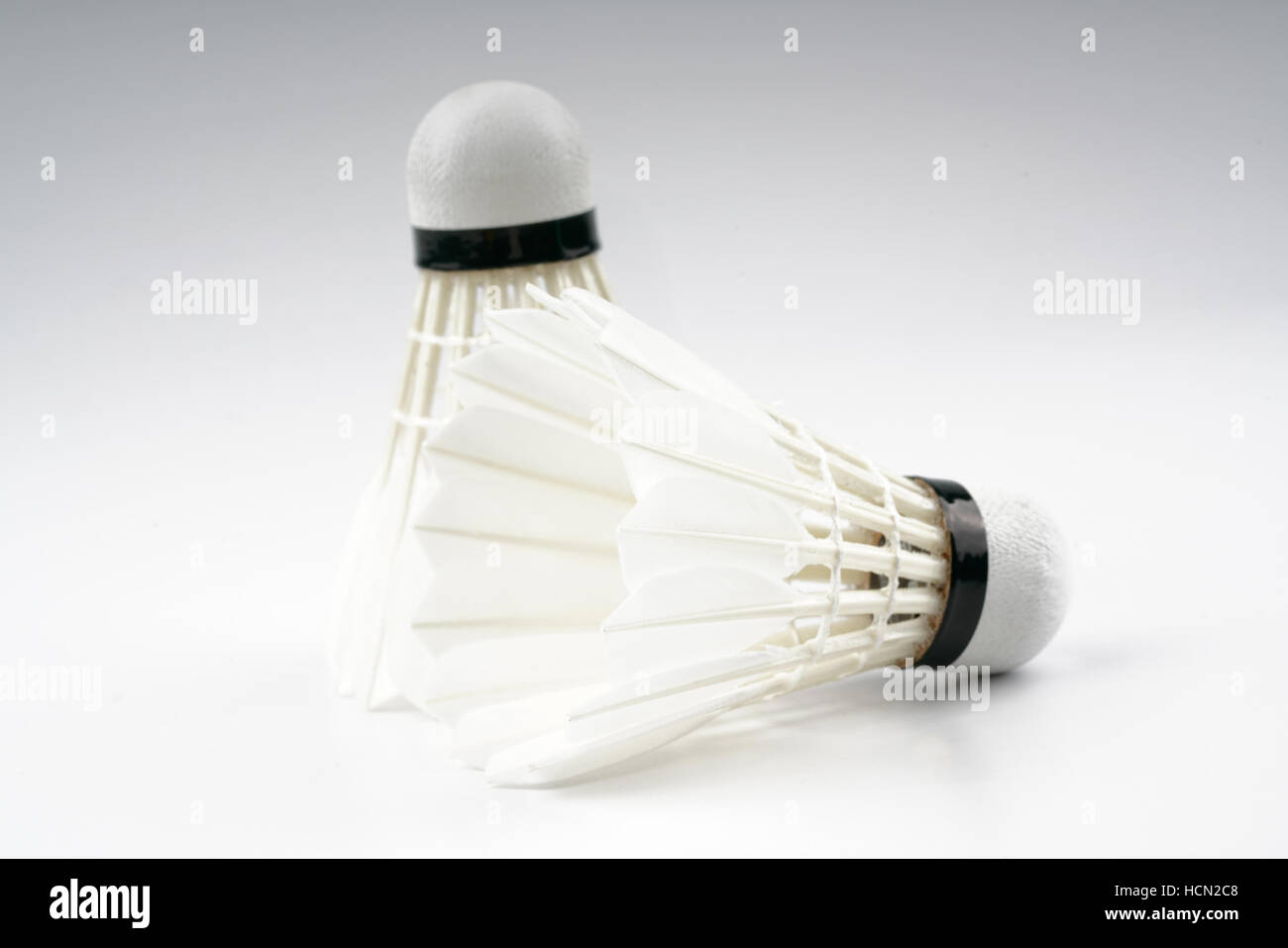 Shuttlecock with white background Stock Photo - Alamy