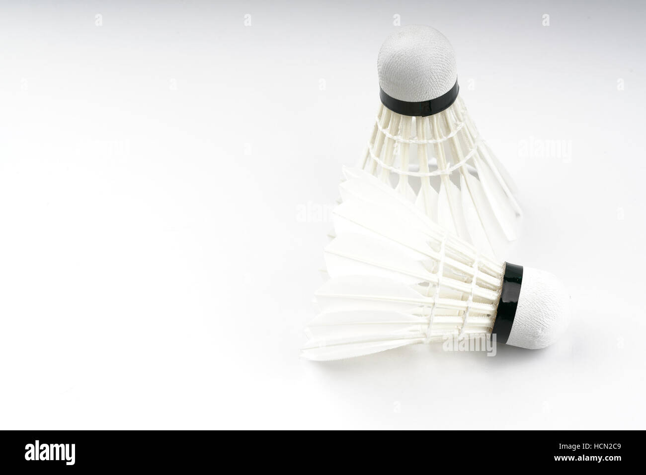 Shuttlecock with white background Stock Photo - Alamy