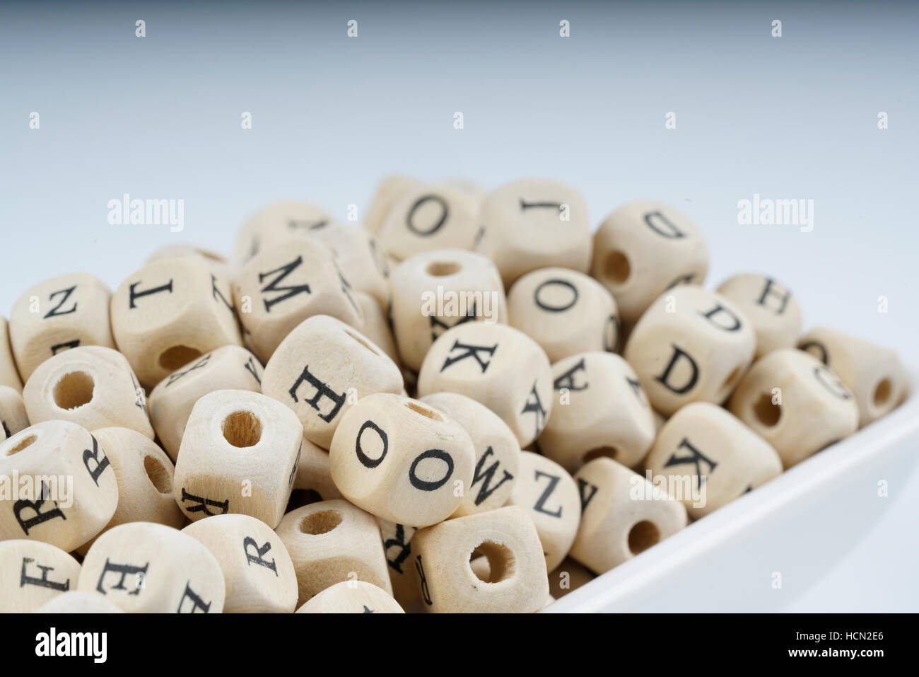 Wooden letter cube with white background Stock Photo - Alamy