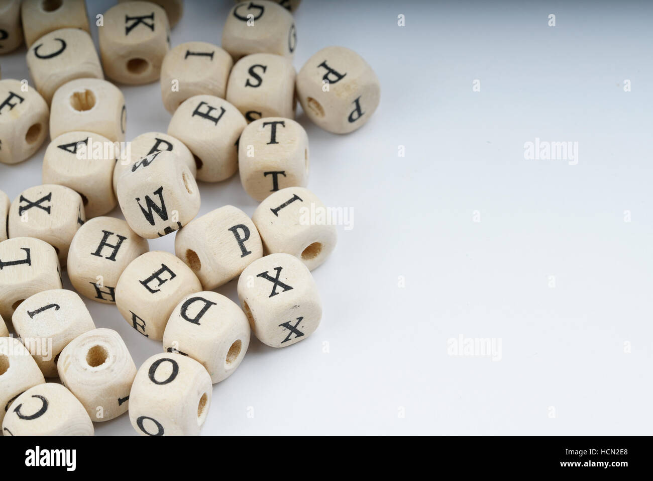 Wooden letter cube with white background Stock Photo - Alamy