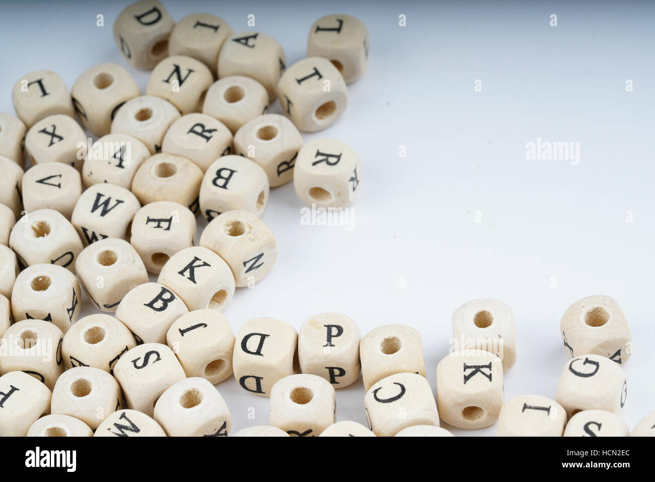 Wooden letter cube with white background Stock Photo - Alamy