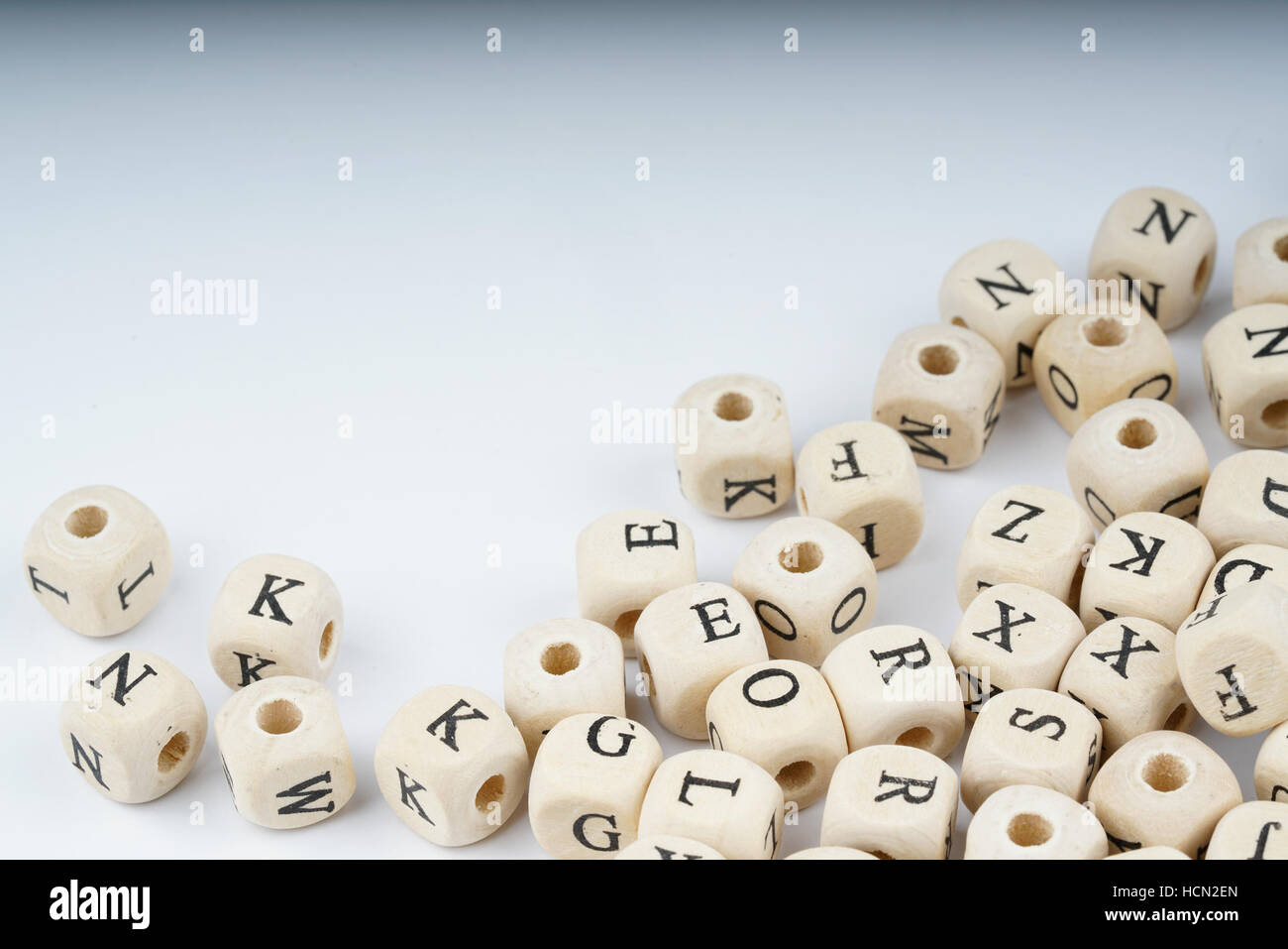 Wooden letter cube with white background Stock Photo - Alamy