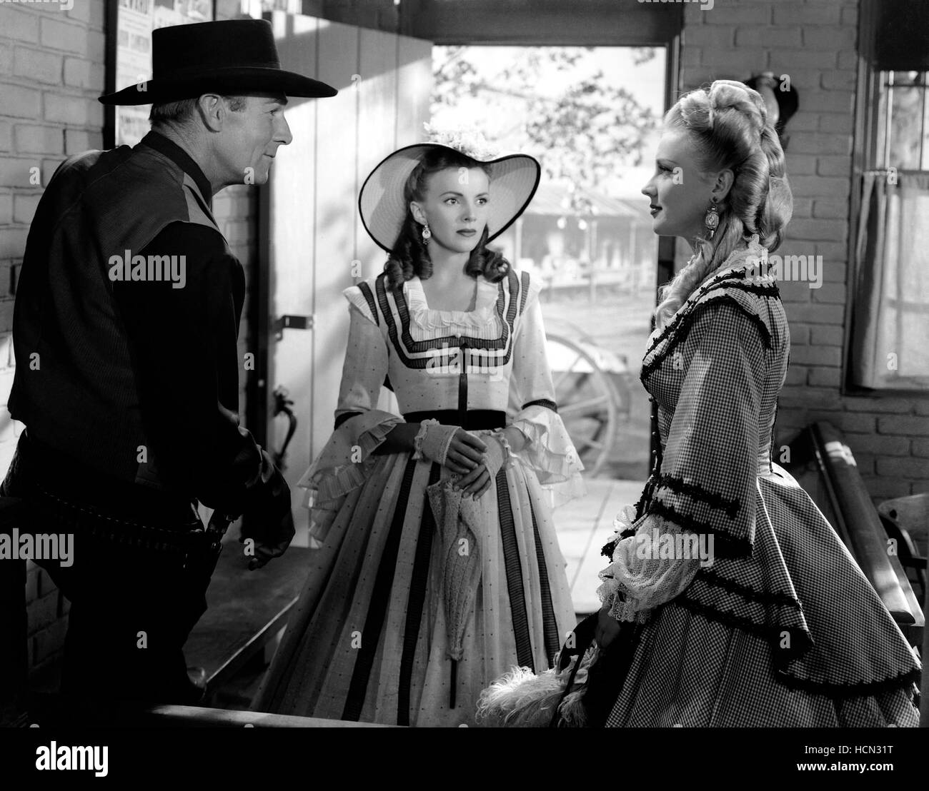 TRAIL STREET, from left: Randolph Scott as Bat Masterson, Madge ...