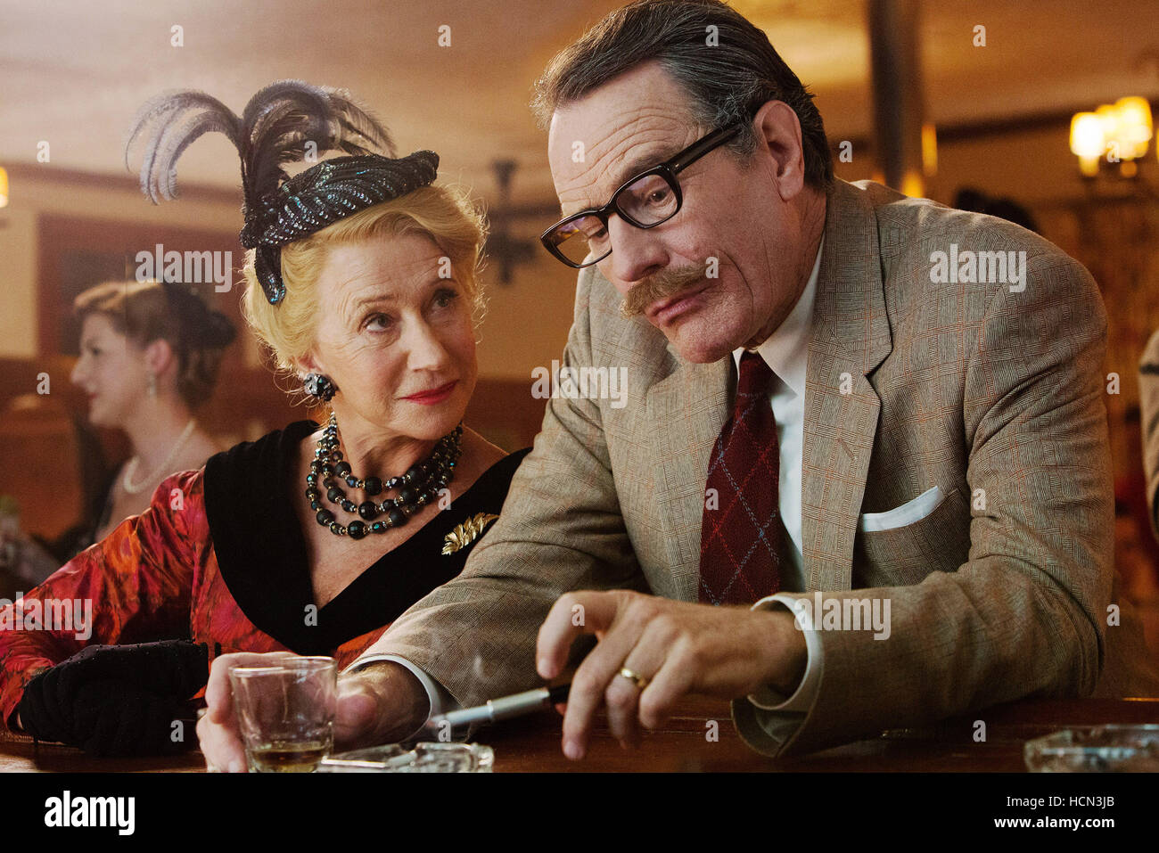 TRUMBO, from left: Helen Mirren, as Hedda Hopper, Bryan Cranston, as ...
