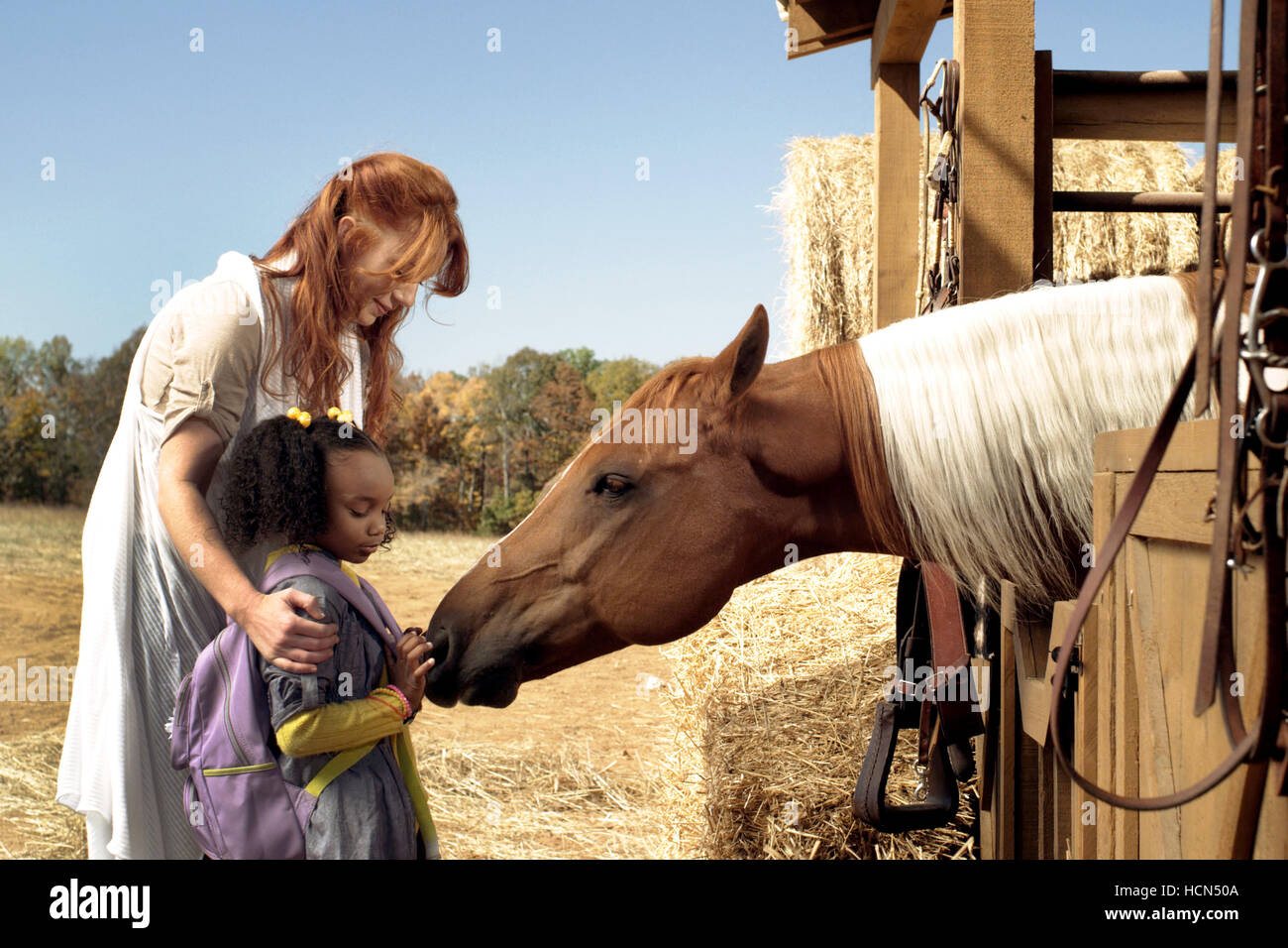 UNCONDITIONAL, from left: Lynn Collins, Gabriella Phillips, 2012. ph ...