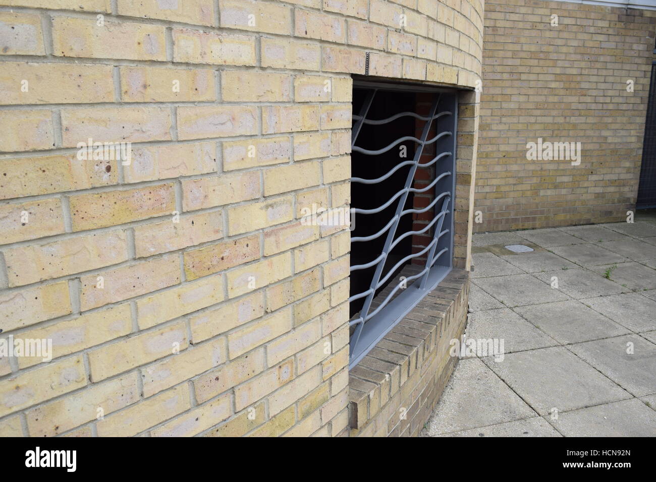 Metal bars covering underground car park Stock Photo - Alamy