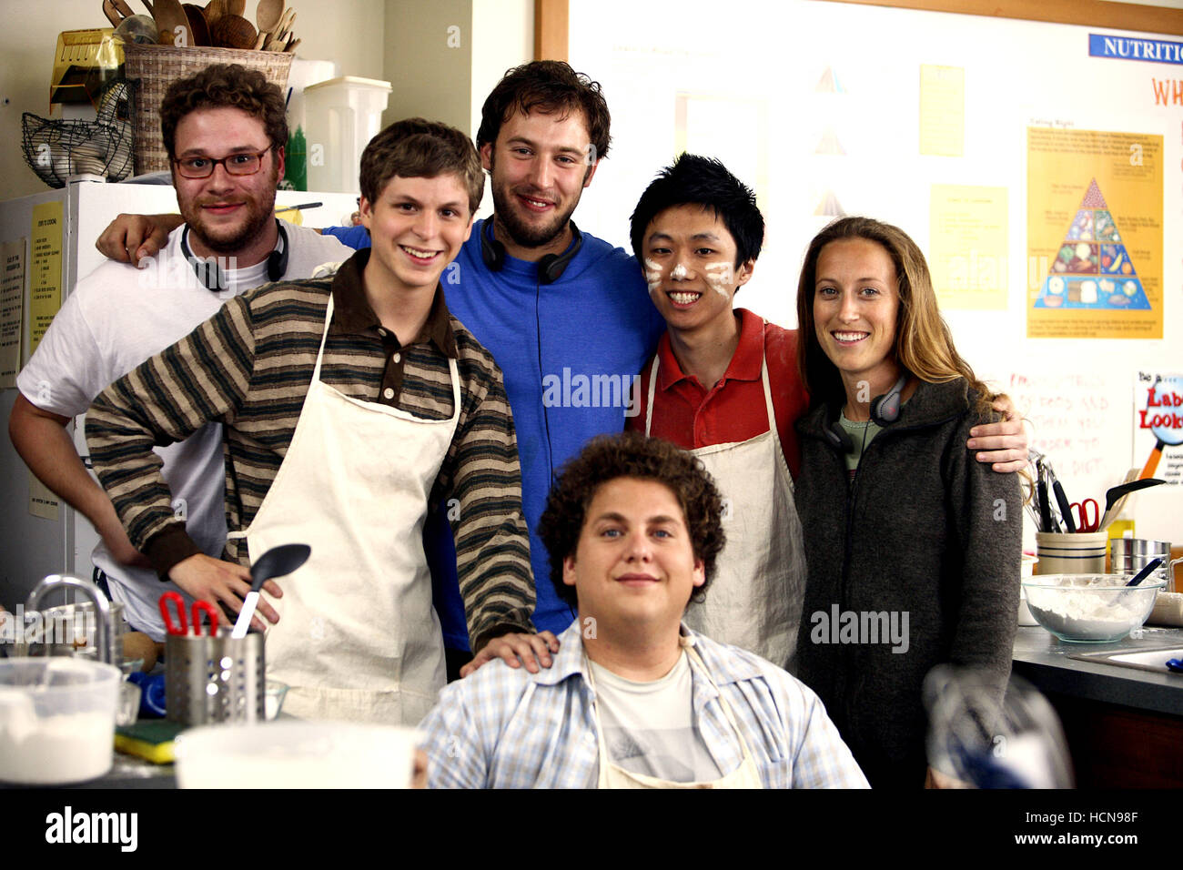 SUPERBAD, writer Seth Rogen (left), Michael Cera (second from left), writer Evan Goldberg (back ...