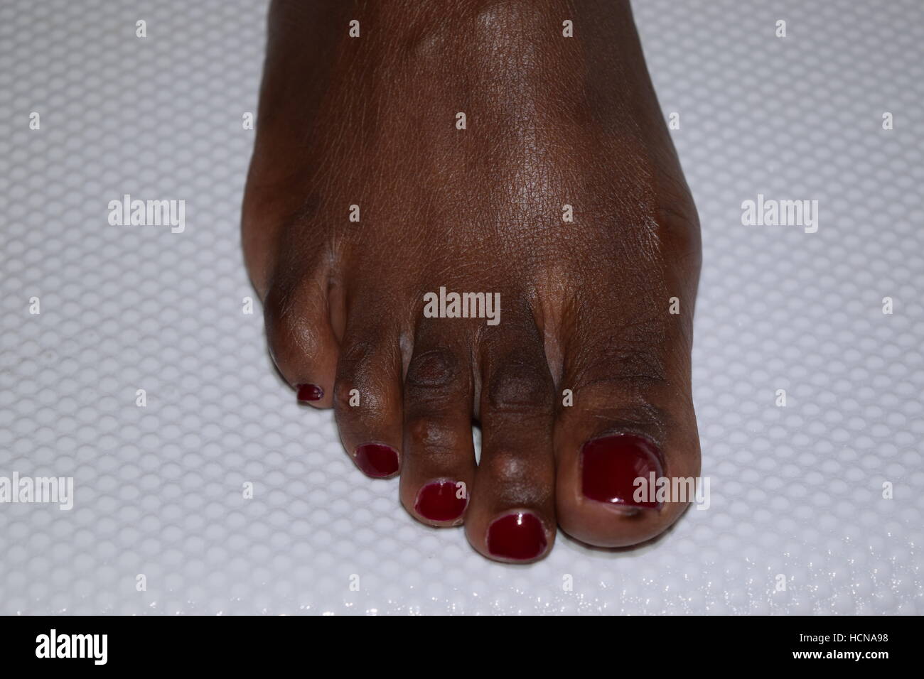Close-up of female foot on a white background showing toes Stock Photo ...