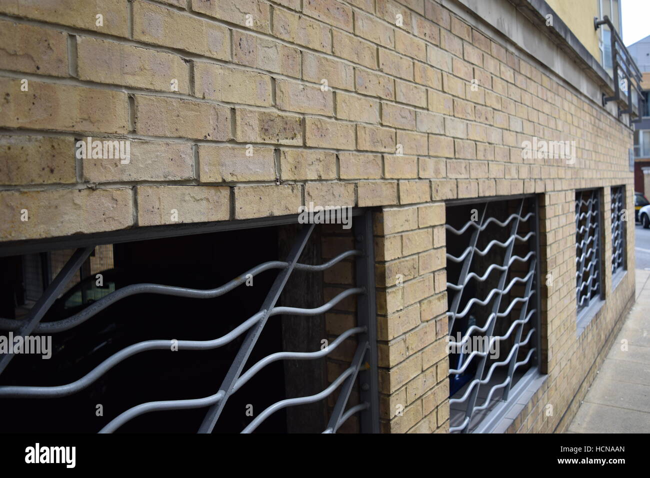 Side view of strong metal bars covering a window for an underground car ...