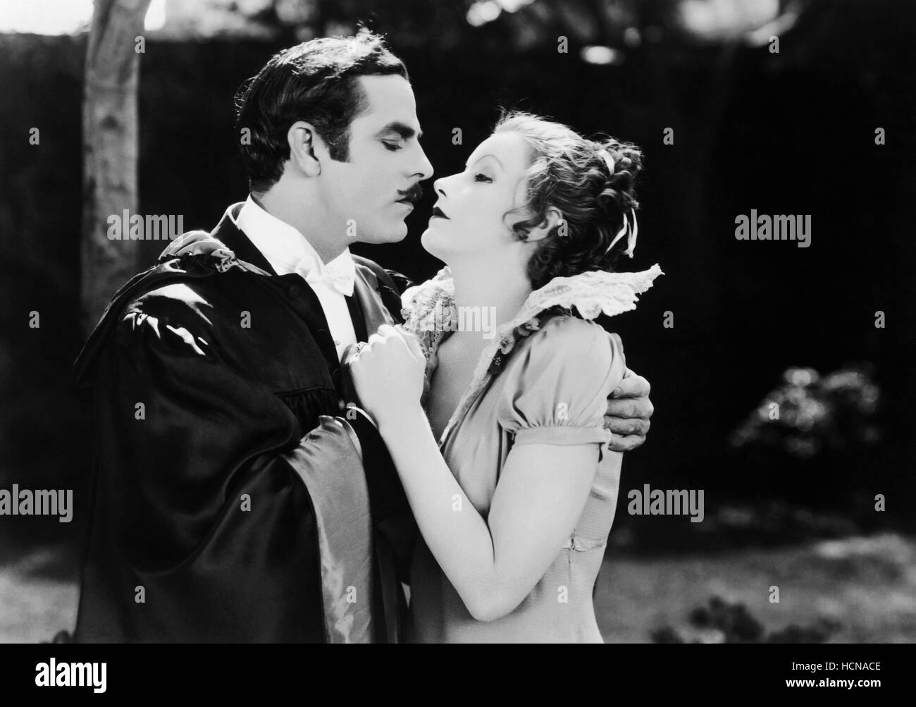 THE TEMPTRESS, from left: Antonio Moreno, Greta Garbo, 1926 Stock Photo ...