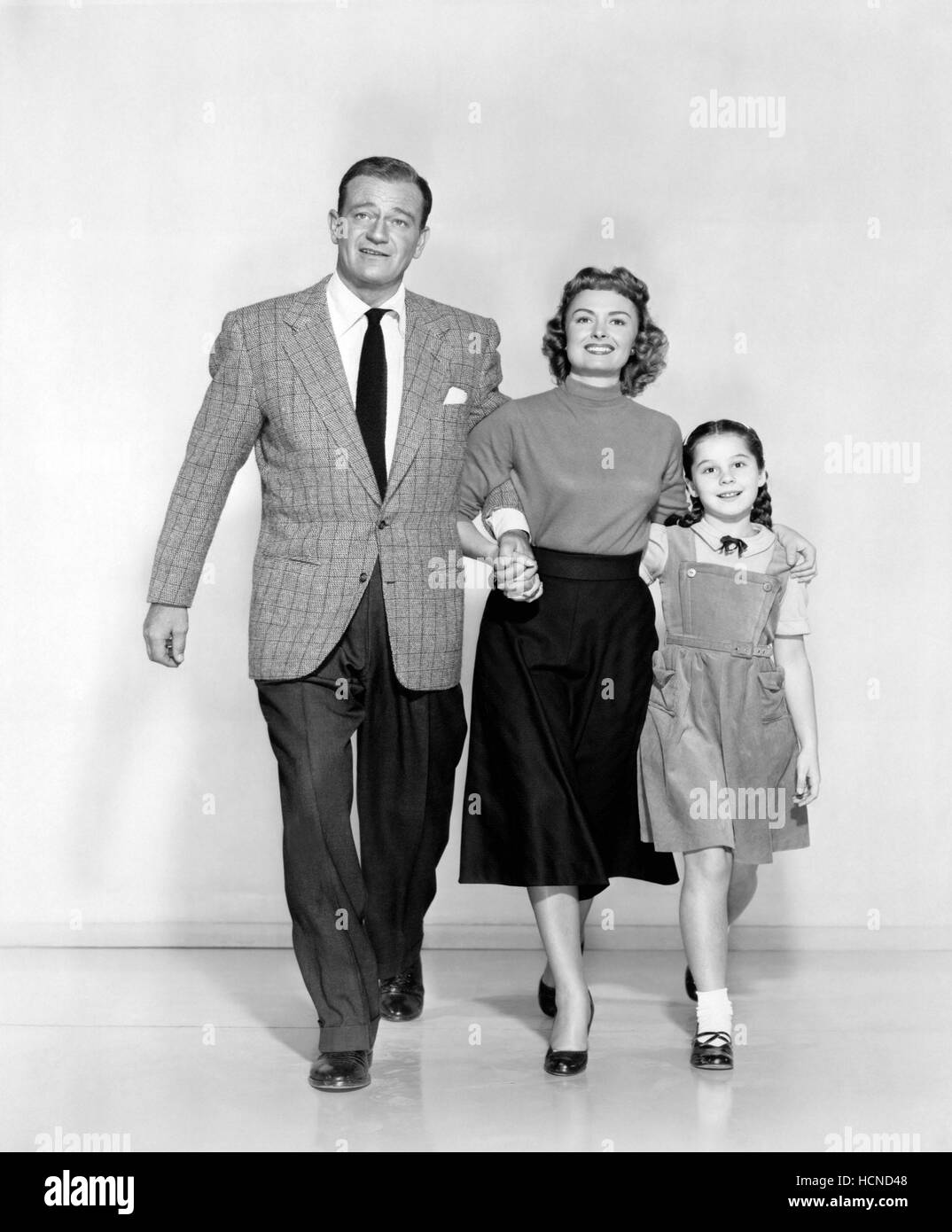 TROUBLE ALONG THE WAY, from left: John Wayne, Donna Reed, Sherry ...