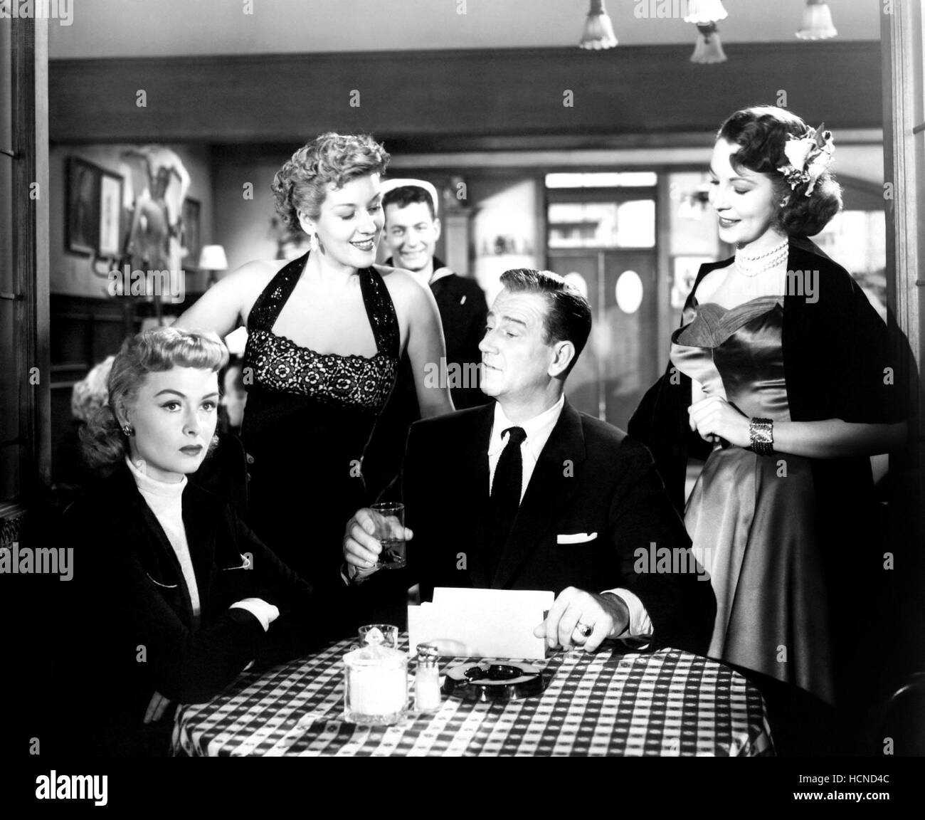 TROUBLE ALONG THE WAY, from left: Donna Reed, Vicki Raaf, John Wayne ...