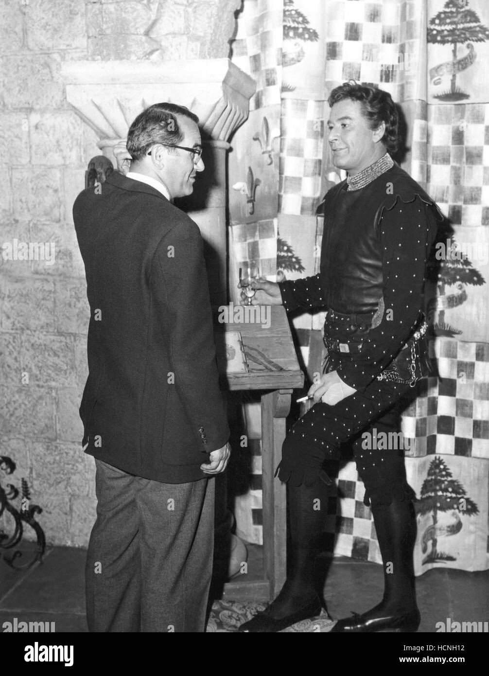From left: director Henry Levin discusses an upcoming scene with star ...