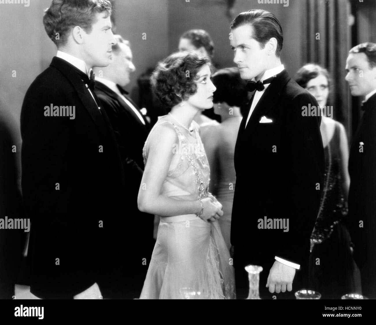 UNTAMED, front from left: Don Terry, Joan Crawford, Robert Montgomery ...