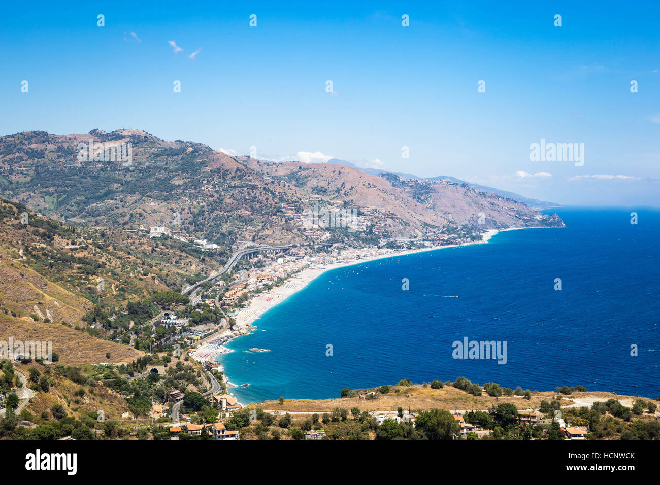 Distant view of a beach in Sicily Stock Photo - Alamy