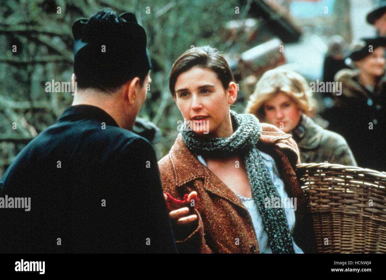 WE'RE NO ANGELS, Robert De Niro (back to camera), Demi Moore (scarf ...
