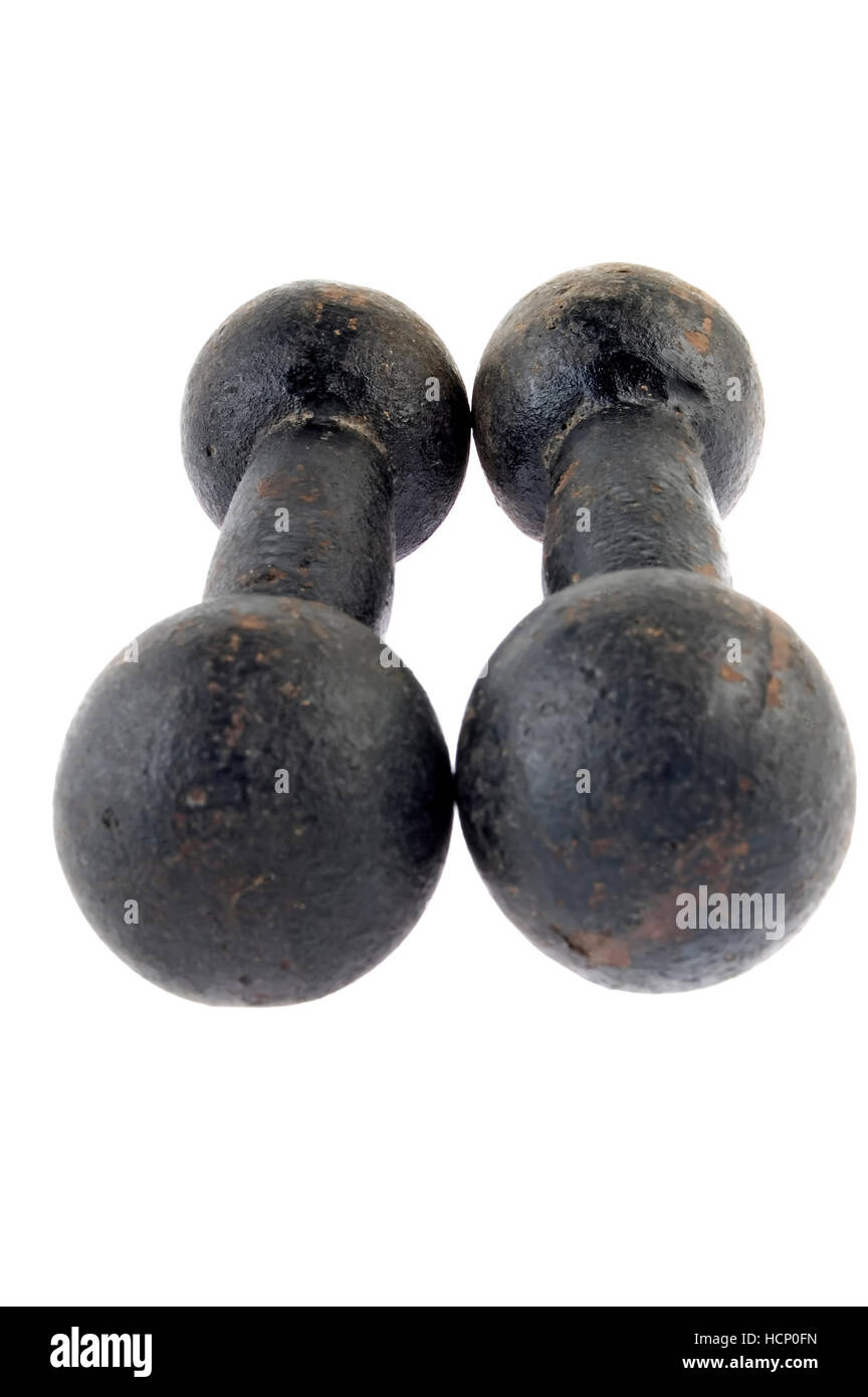Two rusty black dumbbells on white background Stock Photo - Alamy