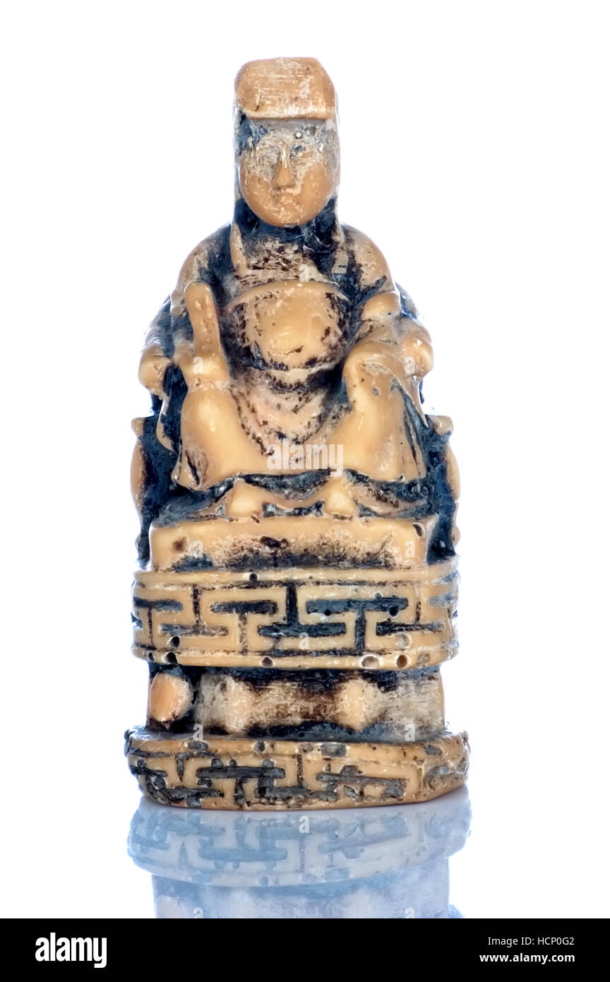 Chinese god statue isolated on white background Stock Photo - Alamy