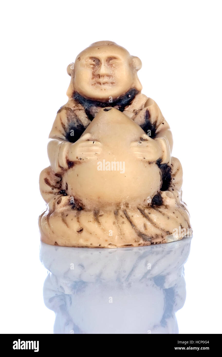 Chinese god statue isolated on white background Stock Photo - Alamy