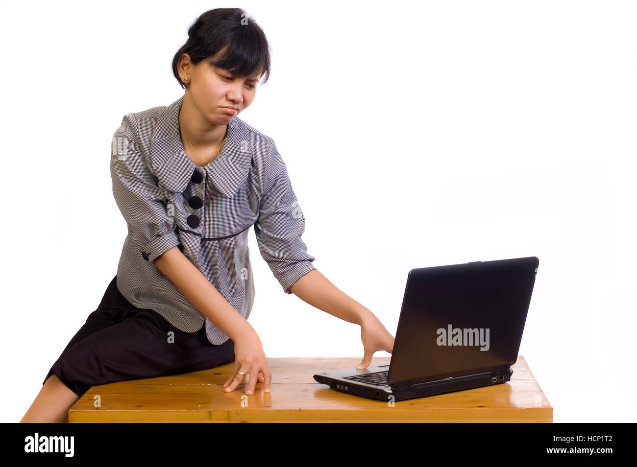 Beautiful asian business woman dizzy using laptop on white background ...