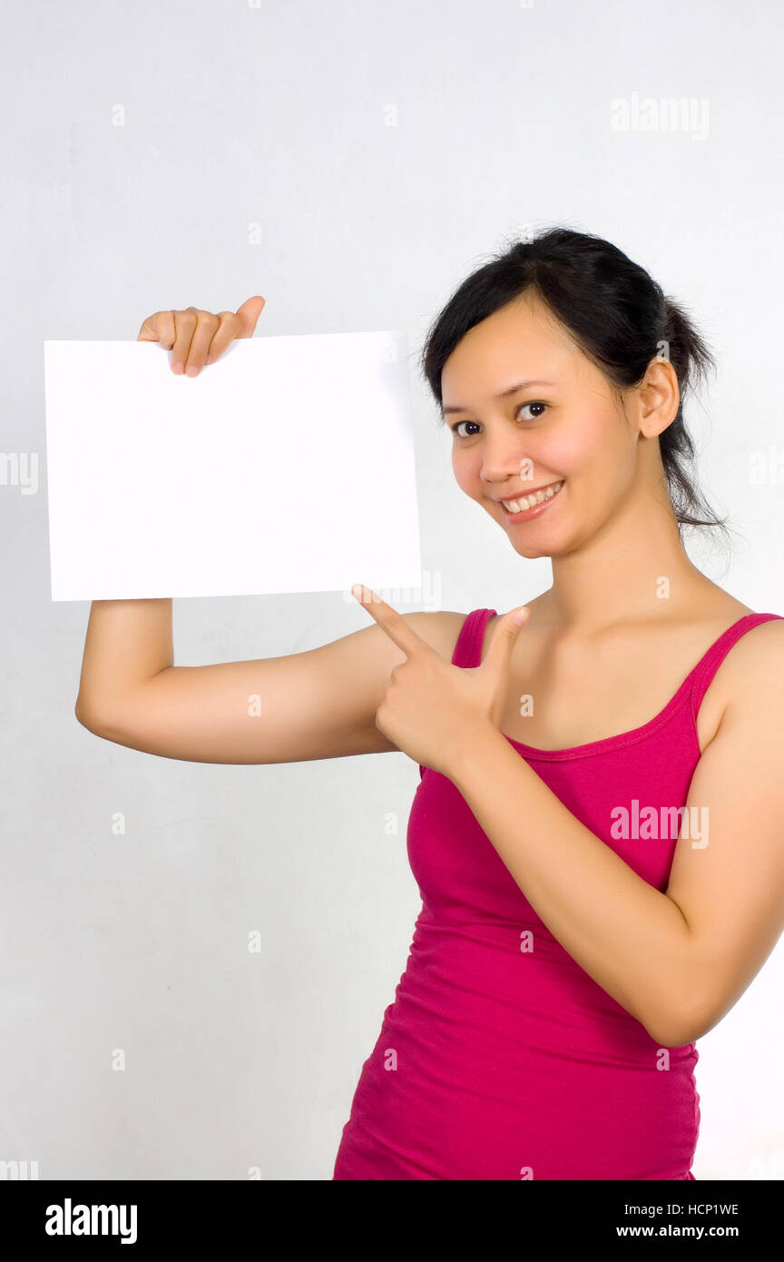 Beautiful Asian Model Holding Blank Sign, You Could Place Your Advertisement on this sheet Stock ...