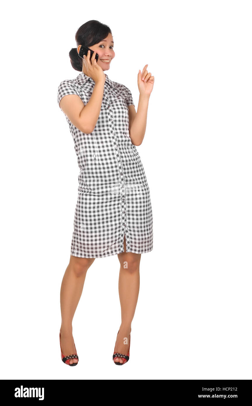 Woman Have Call on Her Cellphone and look happy. Posing in fullbody ...