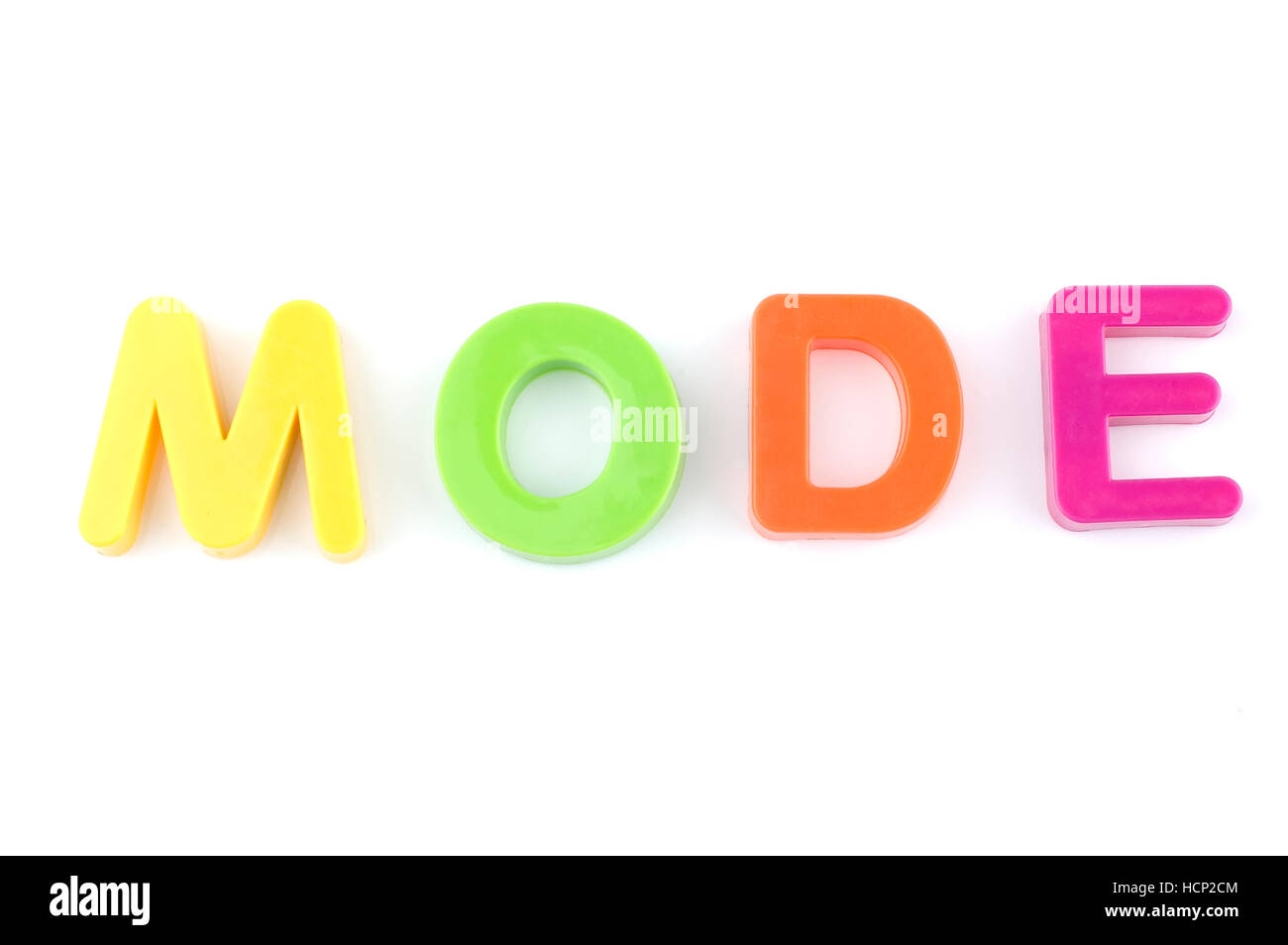 Word mode isolated on white background made from colorful toys letters ...