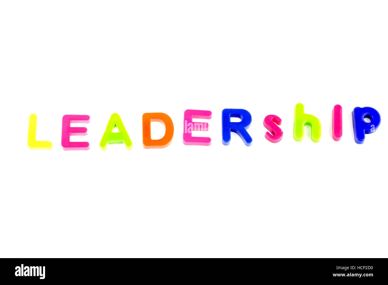 Word leadership isolated on white background made from colorful toys ...