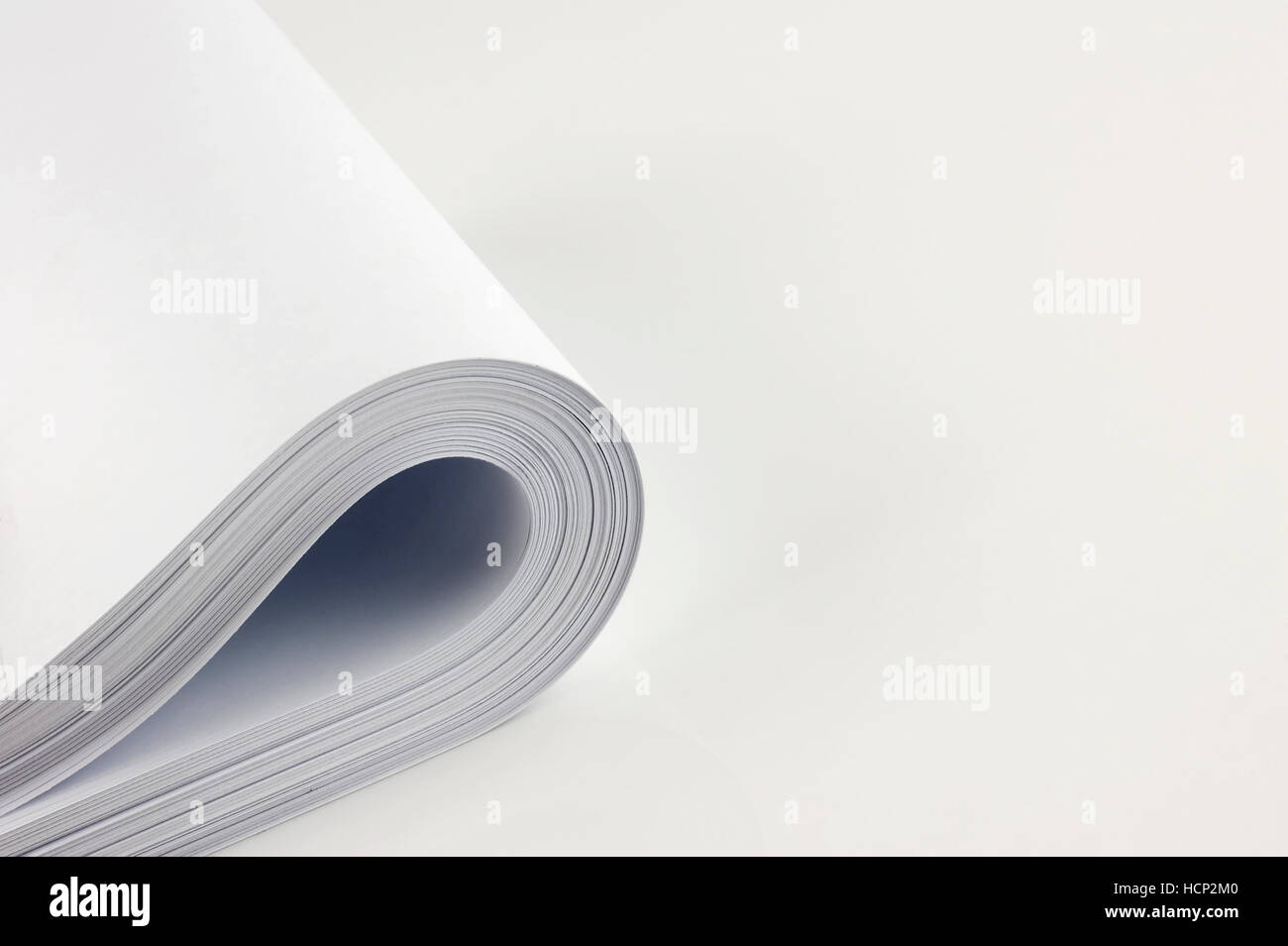 Stacks of white plain paper on white background Stock Photo - Alamy